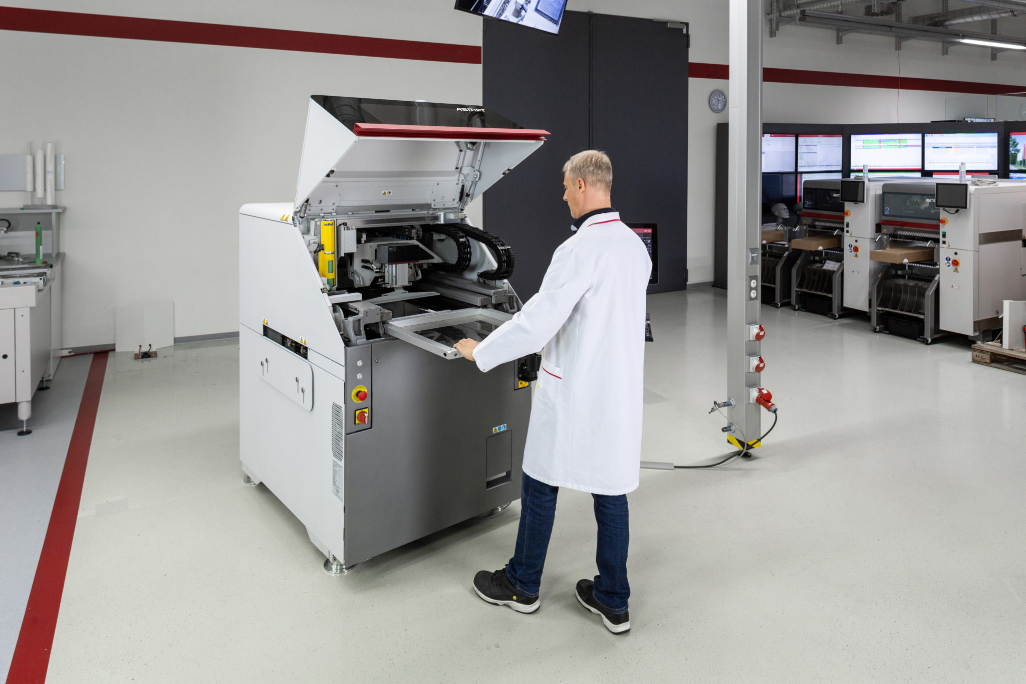 ASMPT DEK TQ with operator-14 – ASMPT SMT Solutions – Picture Database